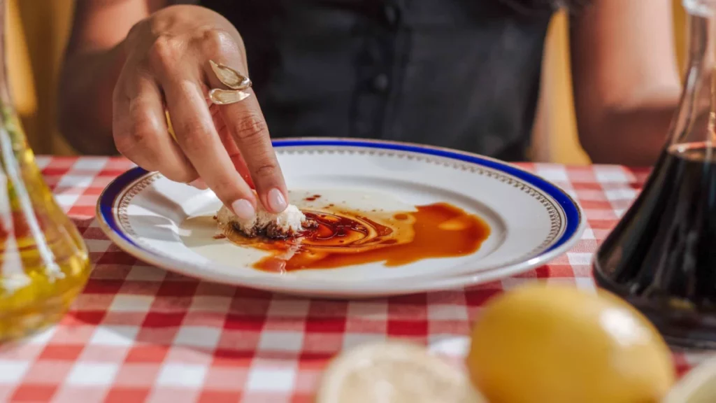 Scarpetta: Is cleaning your plate with bread considered impolite in Italy?